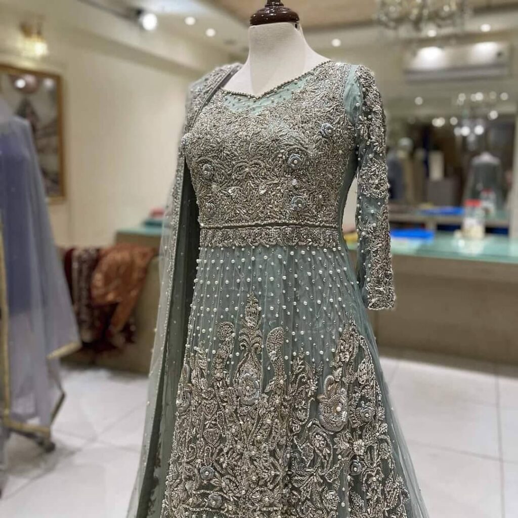 Designer Ice Blue Walima Gown with Golden Embroidery
